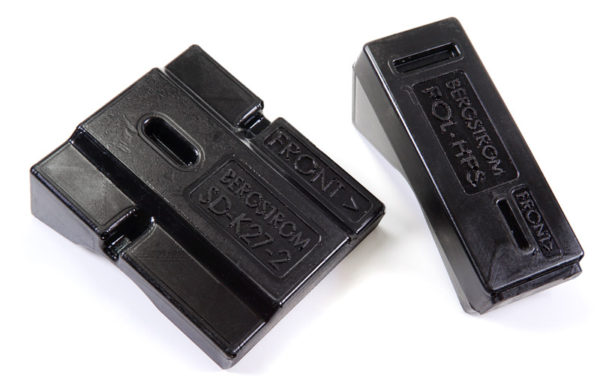 Rubber dampers feature built in shims to improve control